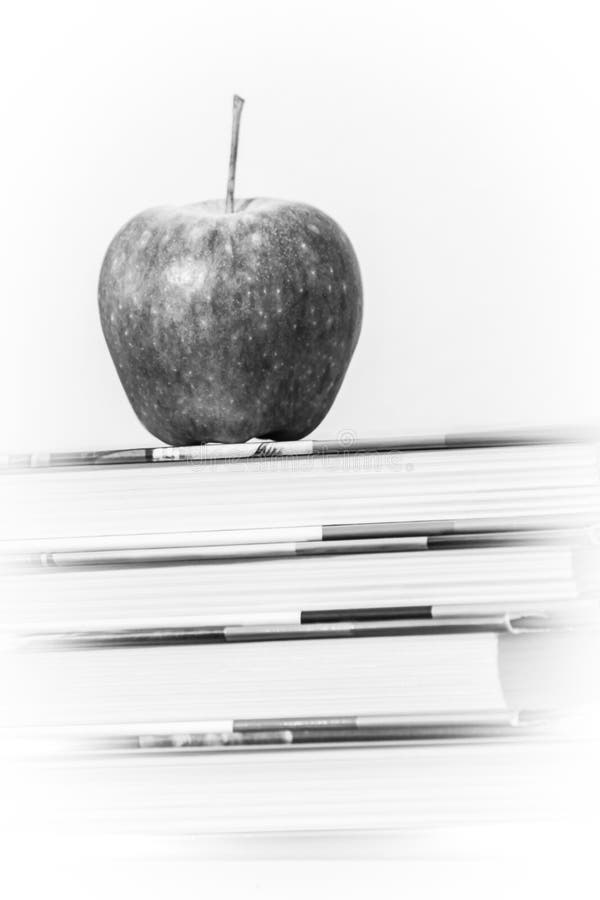 Apple on the books stock photo. Image of break, health - 81110708