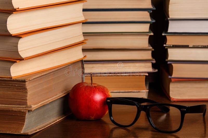Apple and books stock image. Image of eyesight, food - 58121299