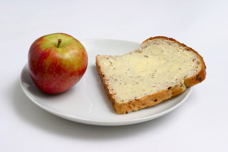 Apple and bread stock photo. Image of grains, dinner, apple - 546920