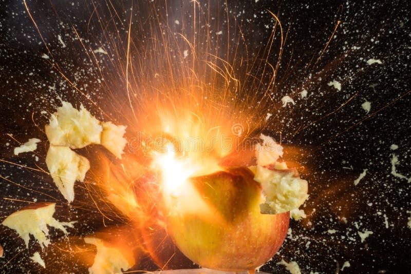 Apple Burst into Pieces on Black Background Stock Photo - Image of ...