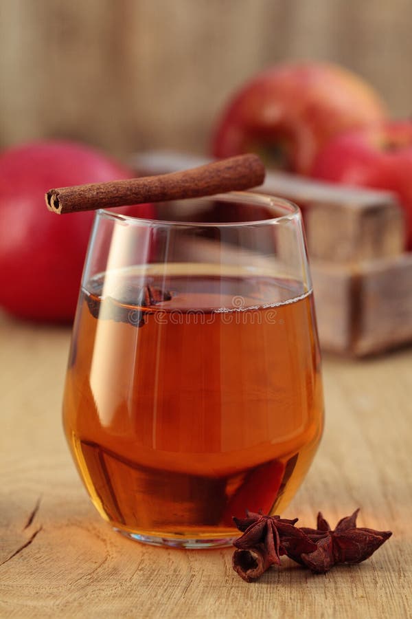 Apple cider with spices. stock photo. Image of flavor - 121362314