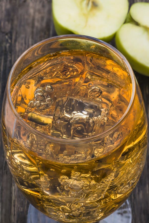 Apple cider with ice cubes stock image. Image of fresh - 56204657