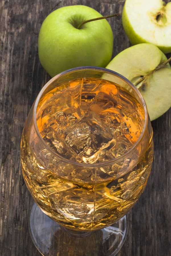Apple cider with ice cubes stock image. Image of apples - 56204673