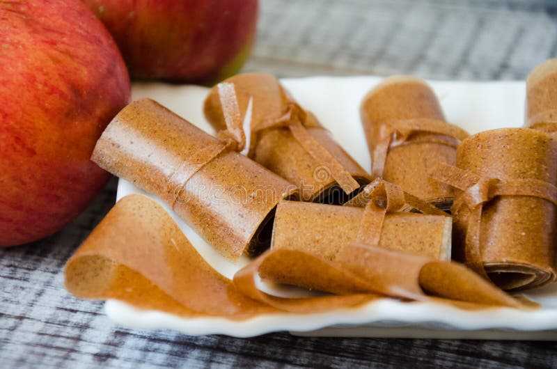 Apple Cinnamon Paper Thin Rolls on the White Dish Stock Photo - Image ...