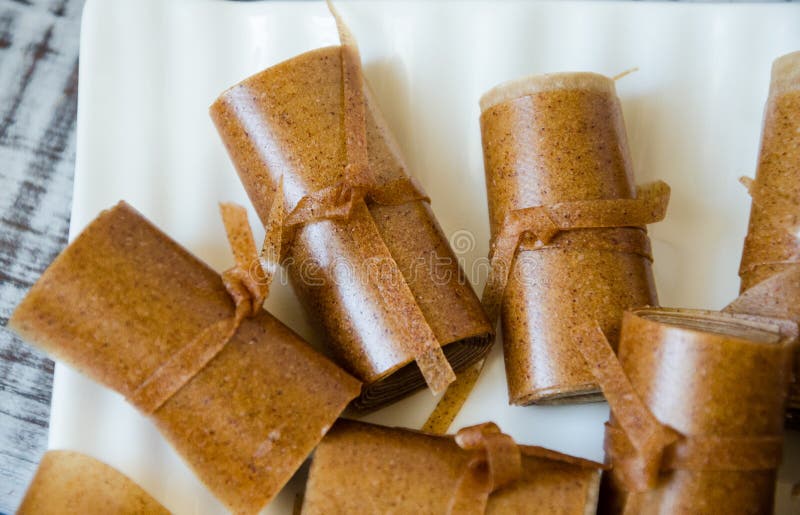 Apple Cinnamon Paper Thin Rolls on the White Dish Stock Photo - Image ...