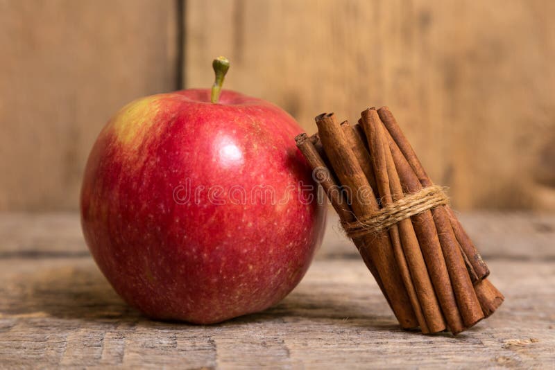 Apple and cinnamon sticks stock image. Image of aroma - 75996073