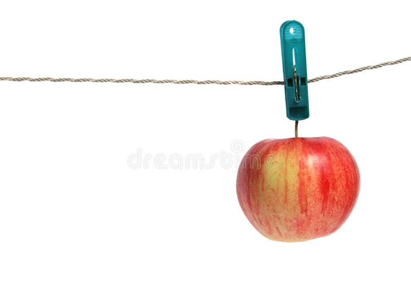 Apple on clothes peg stock image. Image of clothes, clothesline - 11912981