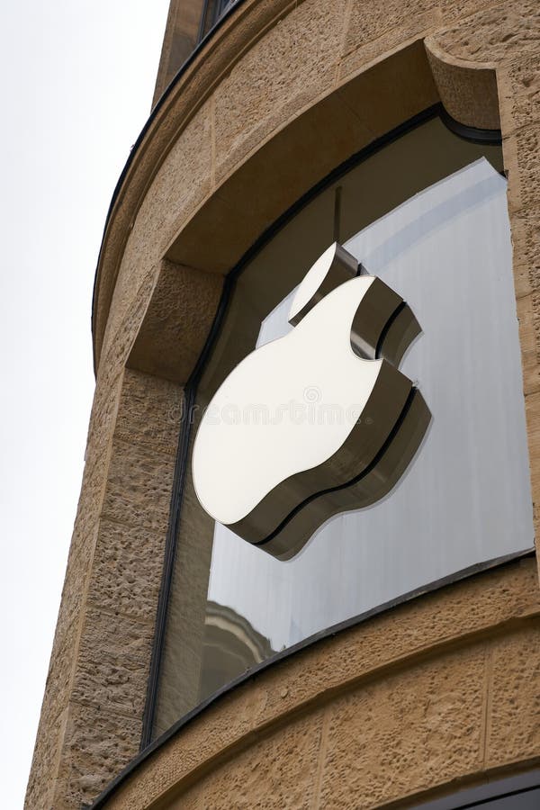 Apple Company Logo on the Window of an Apple Store in Cologne Editorial ...