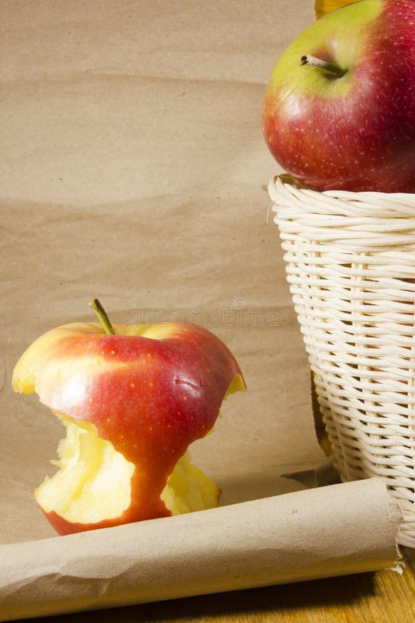 Apple Core and a Basket with Apples Stock Image - Image of lose, scroll ...
