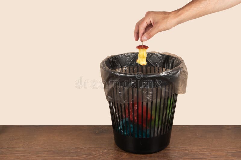 Apple Core is Thrown into Trash, Food Waste Stock Photo - Image of ...