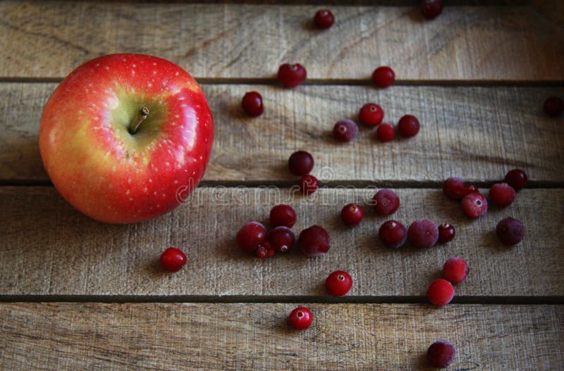 Apple and Cranberries on a Wooden Table Stock Image - Image of berries ...