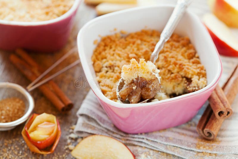 Apple Crumble with Cinnamon on Rustic Table Stock Photo - Image of ...