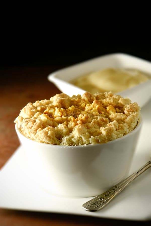 Apple crumble with custard stock image. Image of pudding - 18910709