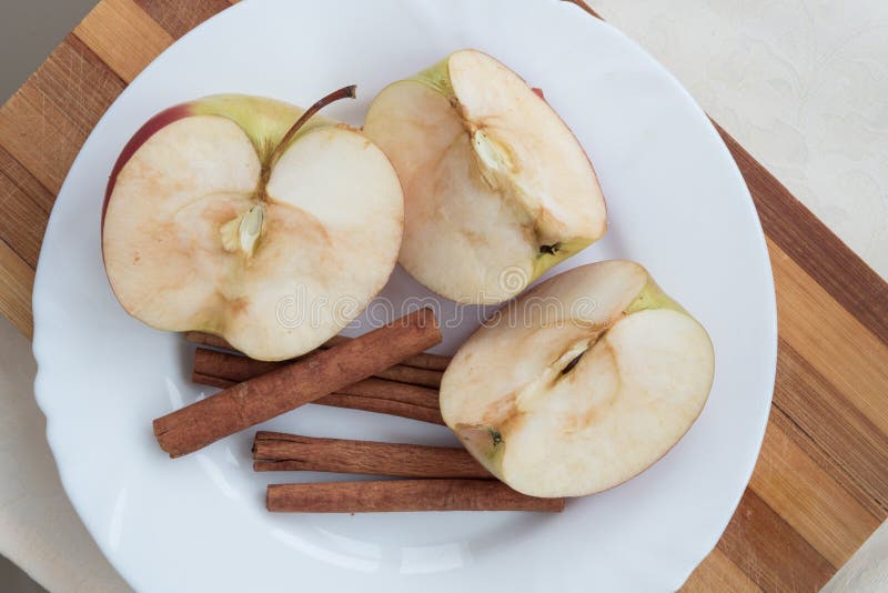 Apple Cut with Cinnamon Sticks Stock Photo - Image of bright, vitamin ...