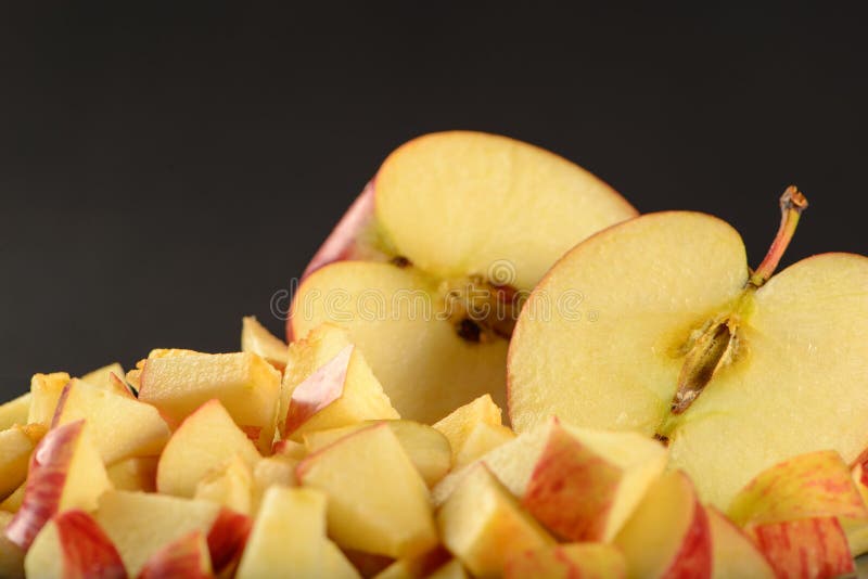 Apple Cut in Half and in Small Pieces Stock Photo - Image of food ...