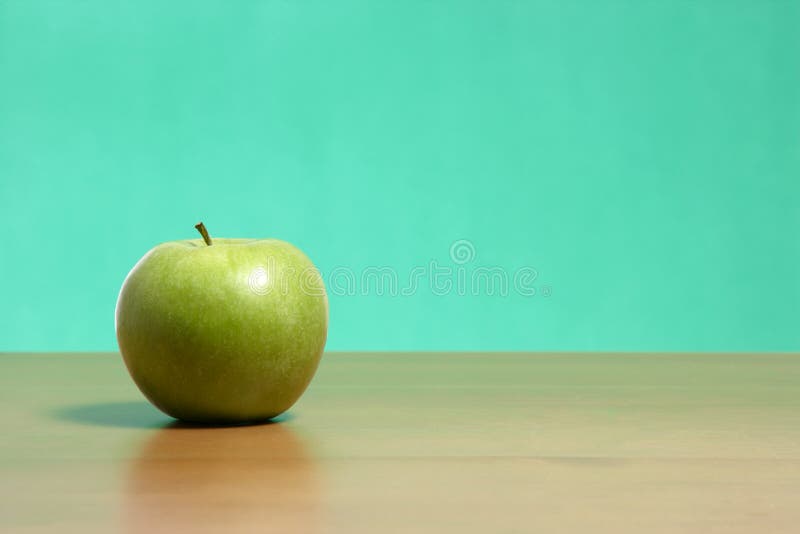 Apple on a desk stock photo. Image of educator, eraser - 6885010
