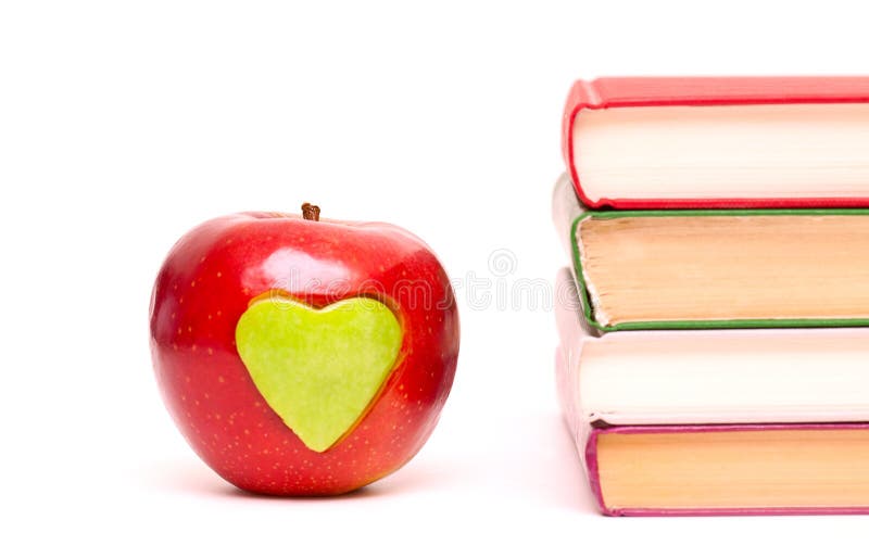 Apple Engraved with a Heart and Stack of Books Stock Photo - Image of ...