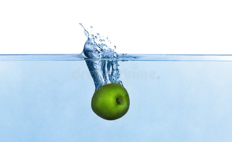 Apple Falling Down into Clear Water Against White Background Stock ...