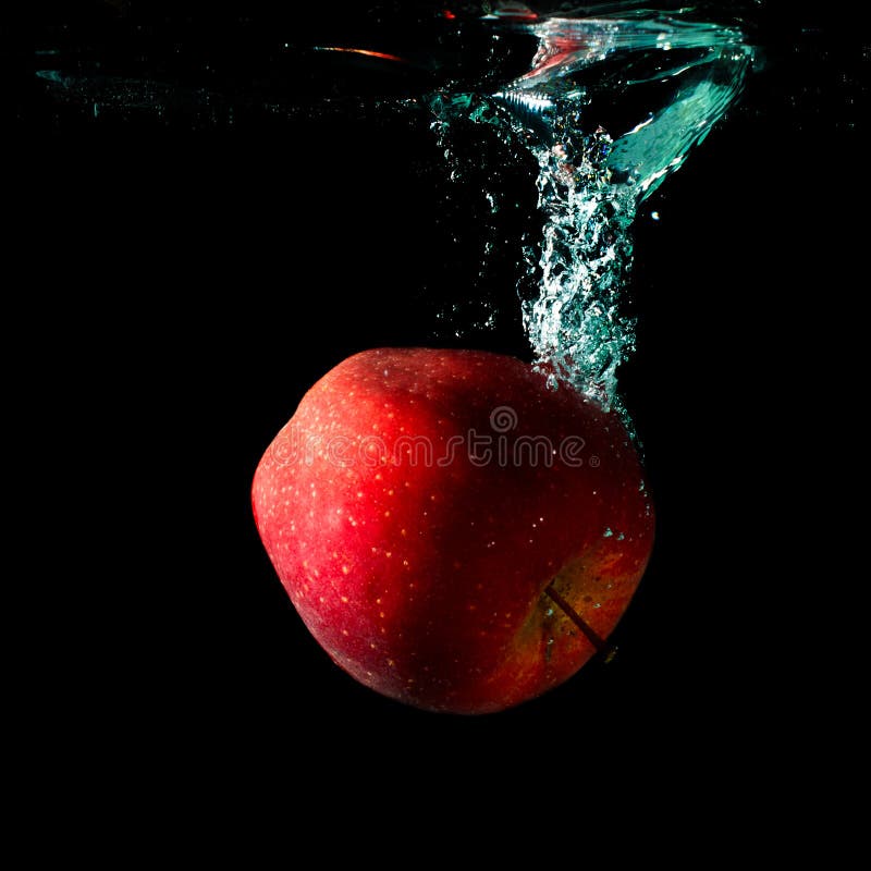 Apple Falling To Water stock photo. Image of aqua, food - 20565104
