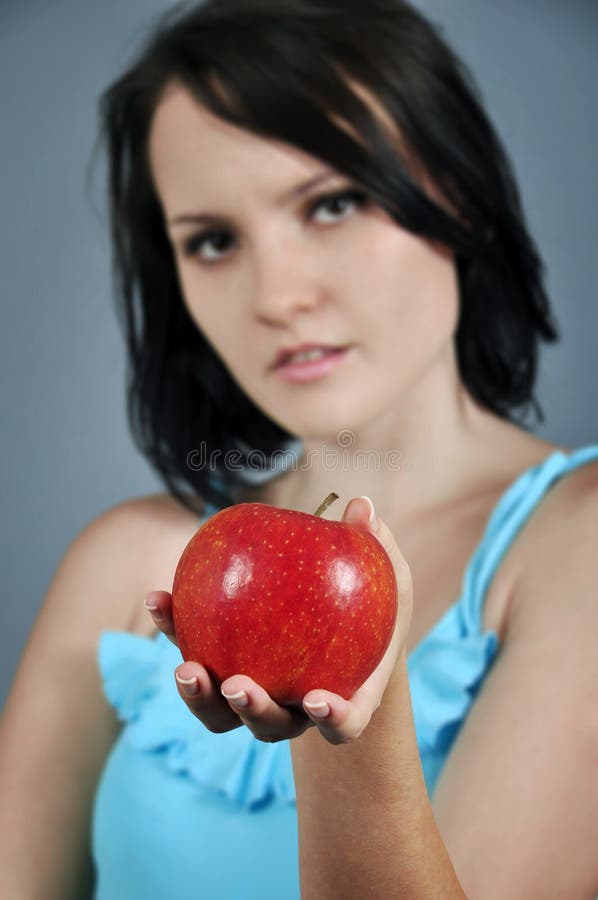 Apple in female hand stock image. Image of enjoyment - 26253645