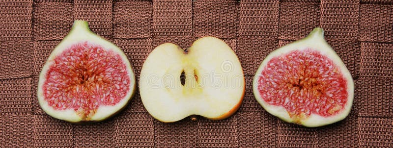 Apple and Fig Slices on Brown Background Stock Image - Image of brown ...