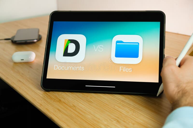 Apple Files Vs Documents Logo on the Screen of IPad Tablet. March 2021 ...