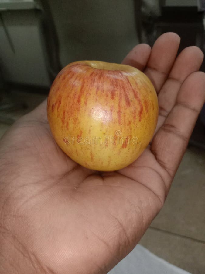 Apple on finger for eat stock image. Image of finger - 299192191