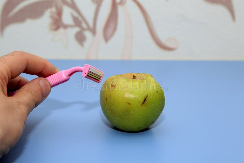 Apple Fruit Green with Shaving Stock Image - Image of hand, person ...