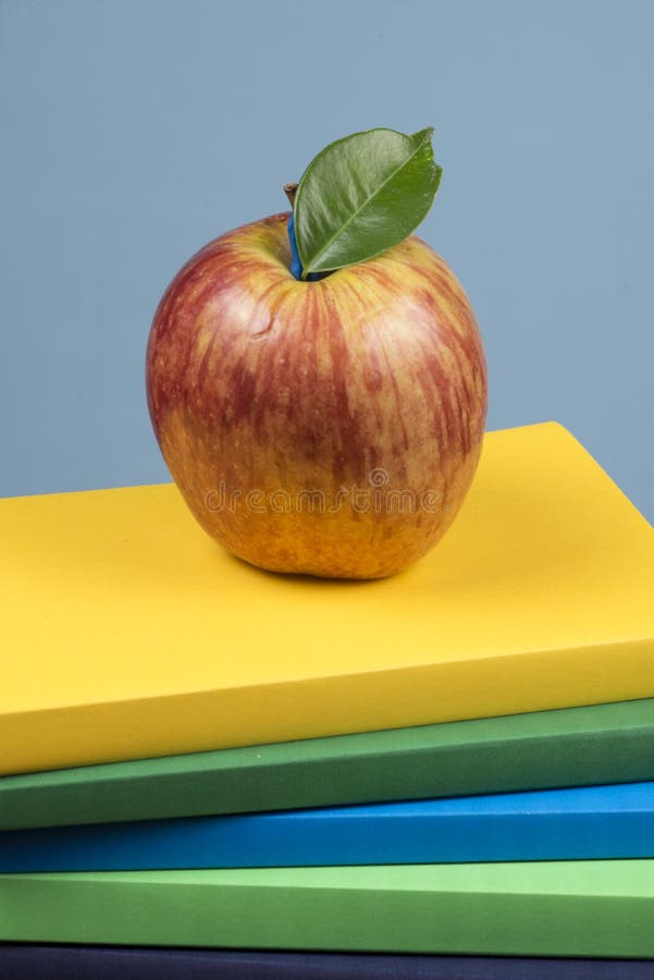 Apple Fruit on Top of a Book Stack, on the Back of School Classes ...