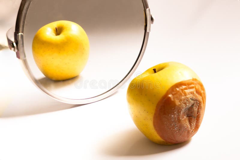 Apple in Good Condition Looking at Itself in the Mirror while Its Back ...