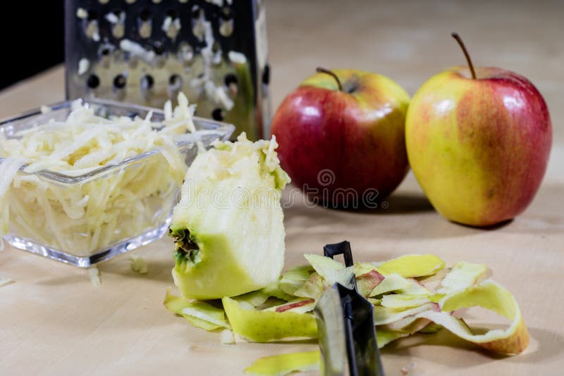 The Apple Grated on a Kitchen Grater. Kitchen Countertop and ...
