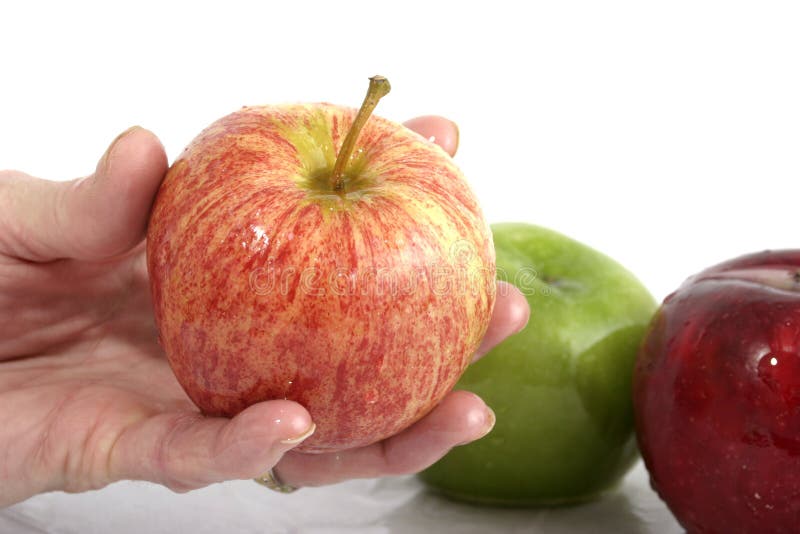 Hand In Apple Picture. Image: 1757689
