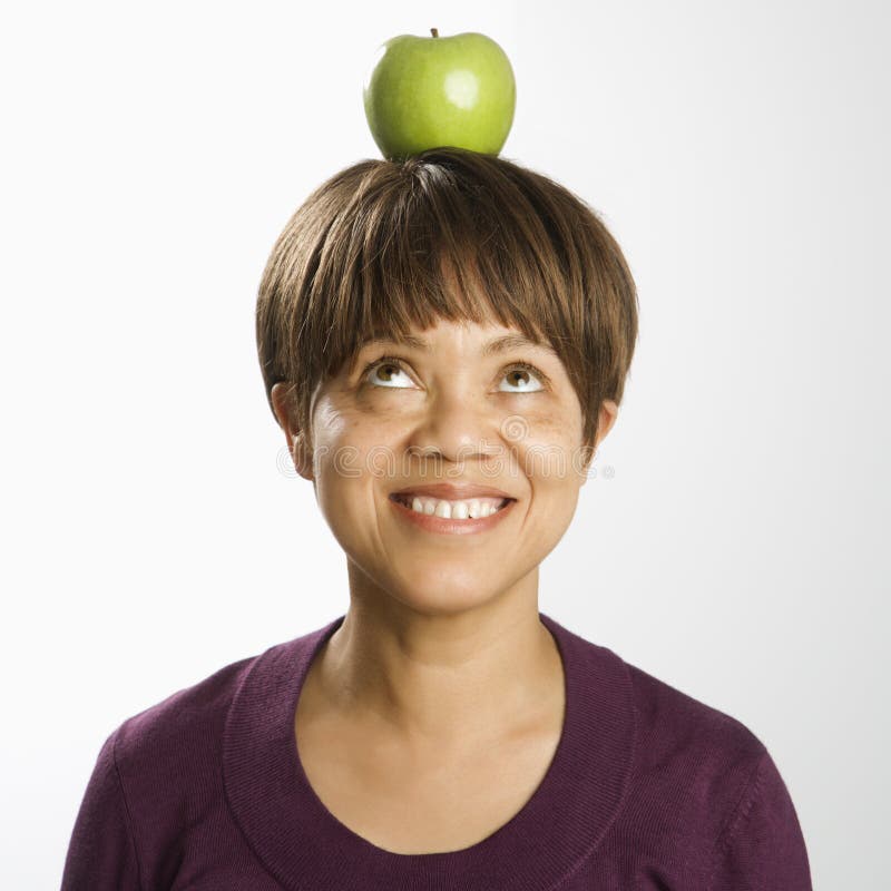Boy with apple on head stock image. Image of child, arrow - 27447193
