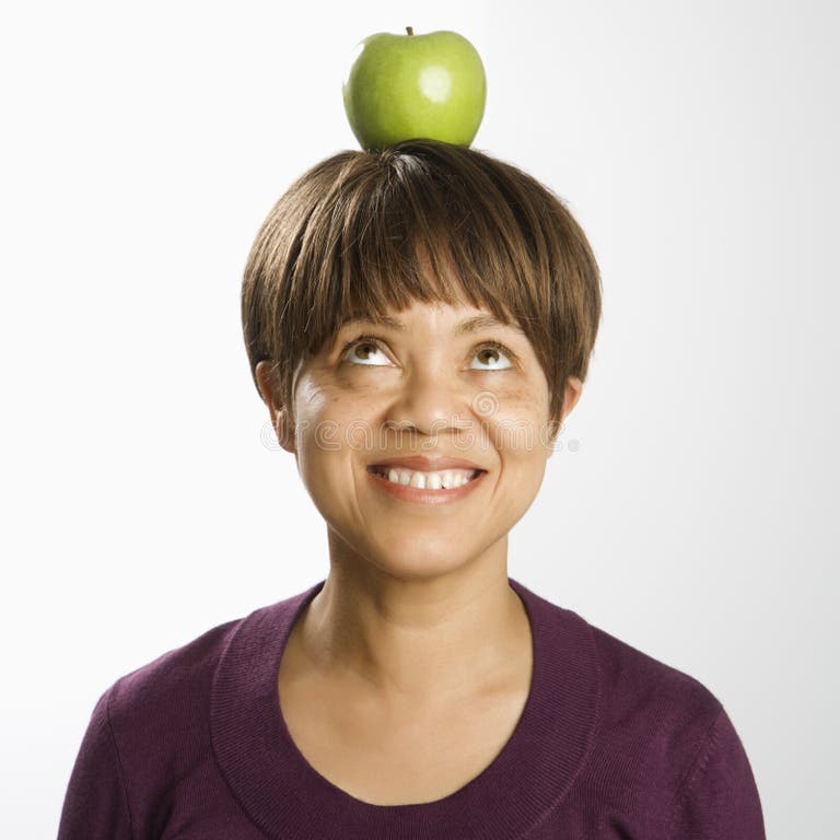 Apple on head. stock photo. Image of head, nutrition, colour - 2431934