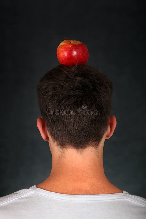 Apple on the Head stock photo. Image of stand, shade - 34535336