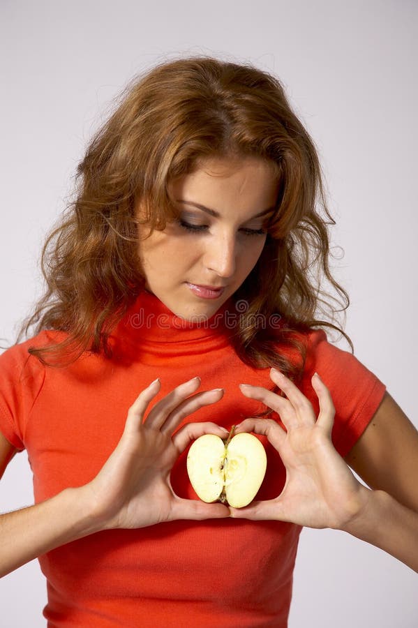 Apple on heart stock image. Image of heart, fruit, looking - 2523049