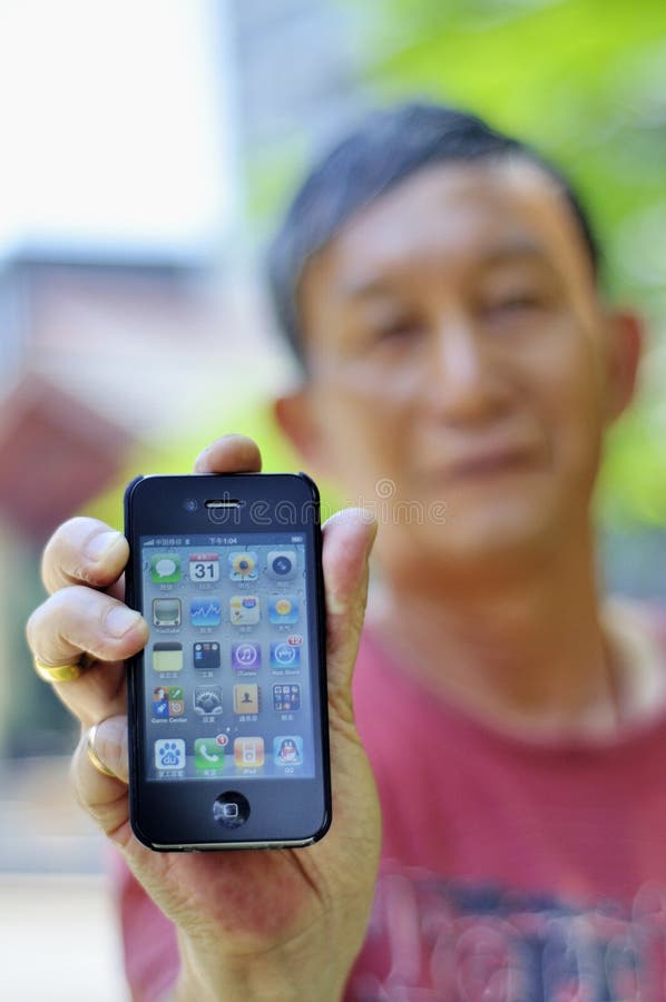 Apple iPhone 4 editorial stock photo. Image of apple - 19716683