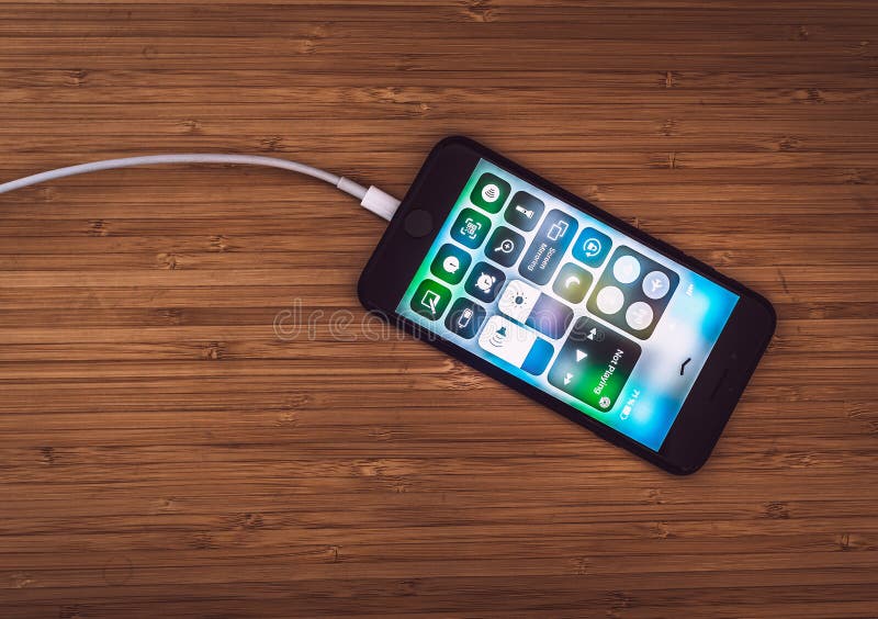 Apple IPhone-7 Black Smartphone on Table Charges and Shows the Quick ...