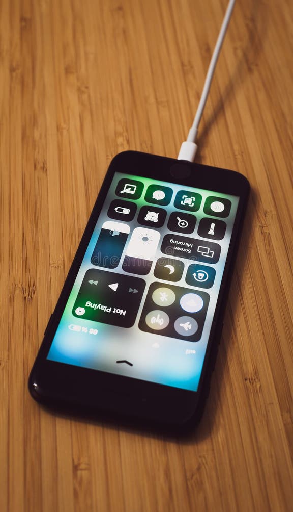 Apple IPhone-7 Black Smartphone on Table Charges and Shows the Quick ...