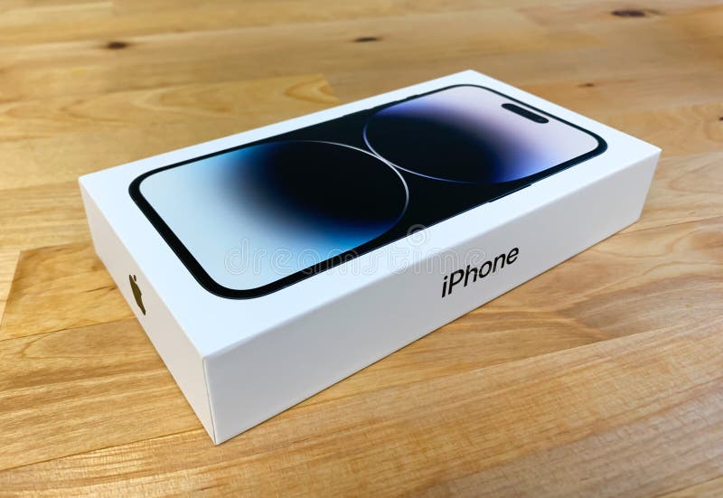 Apple IPhone 14 Pro in Box on Wooden Desk, Angled Side View. Editorial ...