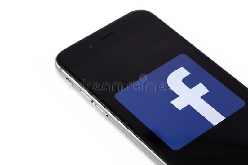 IPhone and Facebook logo editorial photo. Image of holding - 119971131