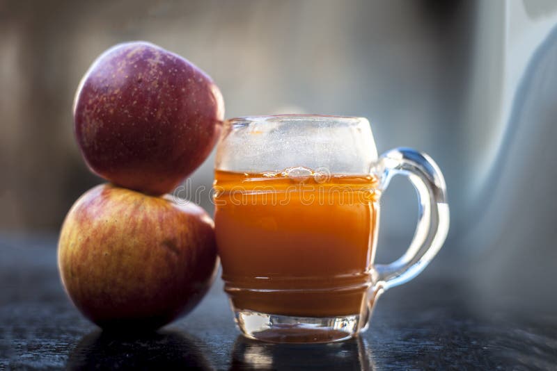 Apple Juice in a Transparent Glass with Two Raw Apples in Side,close Up ...