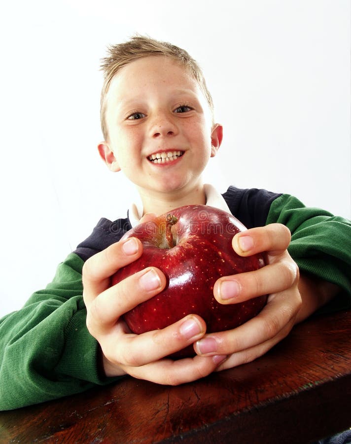 Sweet child with red apple stock image. Image of healthy - 32974559