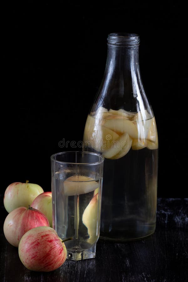 Apple Kompot in Glass Bottle on Black the Background Stock Photo ...