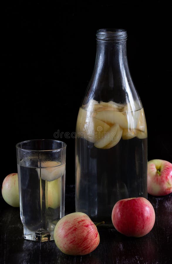 Apple Kompot in Glass Bottle on Black the Background Stock Photo ...
