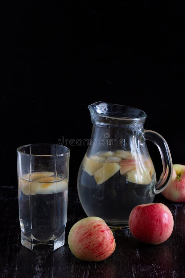 Apple Kompot in Glass Bottle on the Black Background Stock Photo ...