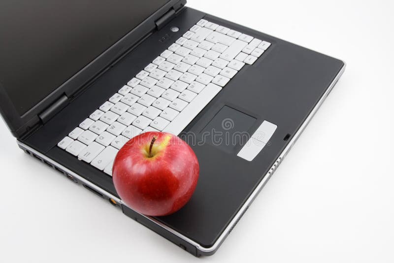 Apple on the laptop stock image. Image of desk, hardware - 1817997