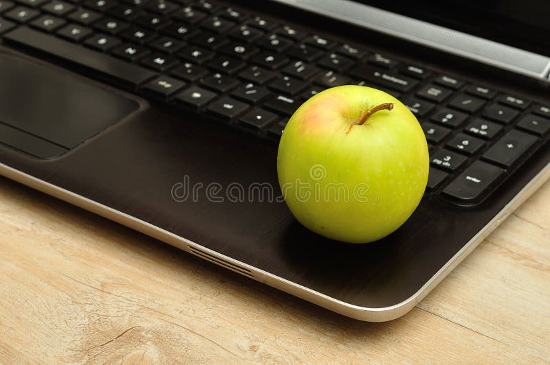 Apple and laptop stock photo. Image of computer, office - 70805930