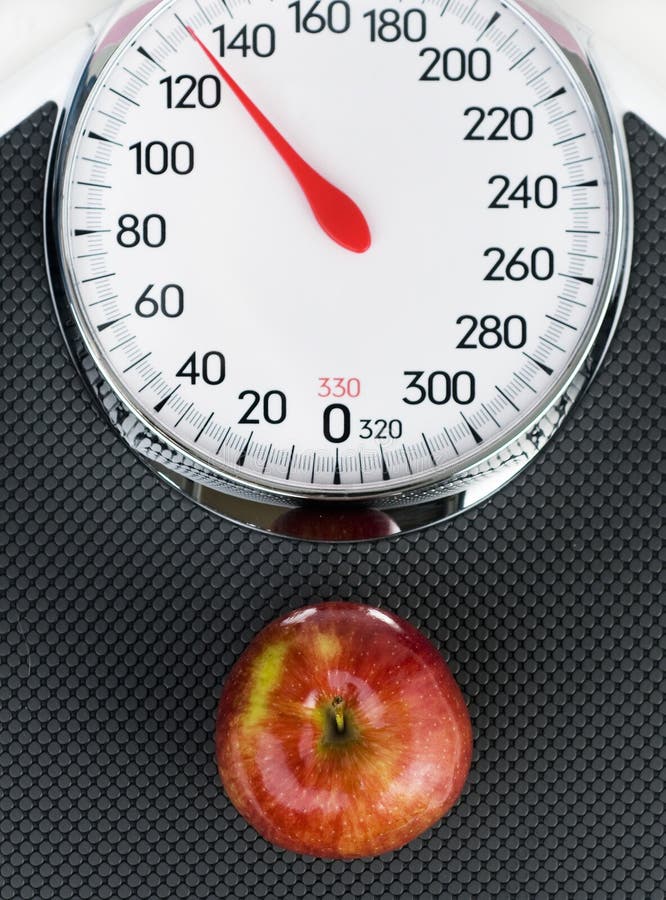 Apple Laying on Weight Scale S Stock Photo - Image of medicine, scale ...
