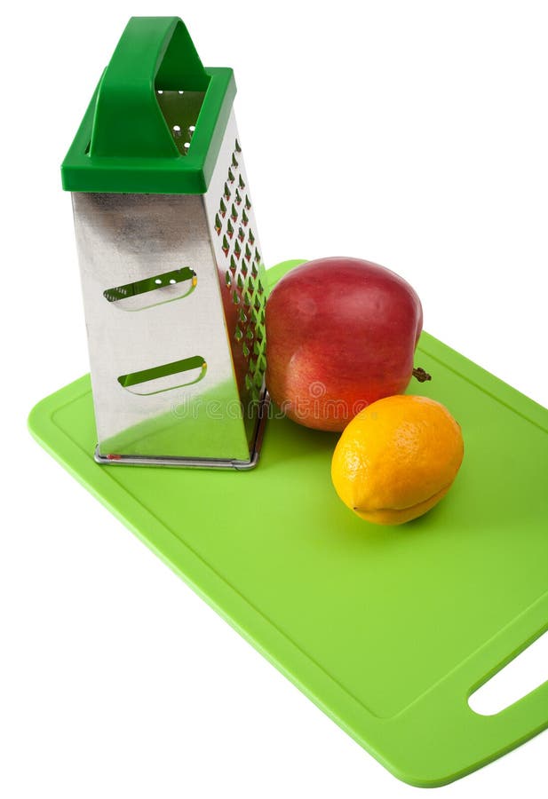 Apple, lemon and grater stock image. Image of background - 23457411